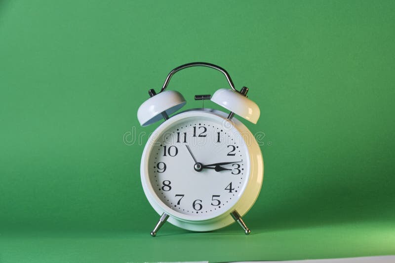 Clock Hands Go on a Green Background Stock Photo - Image of equipment ...