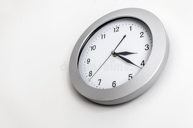 Clock hanging on wall stock photo. Image of office, watch - 61839114
