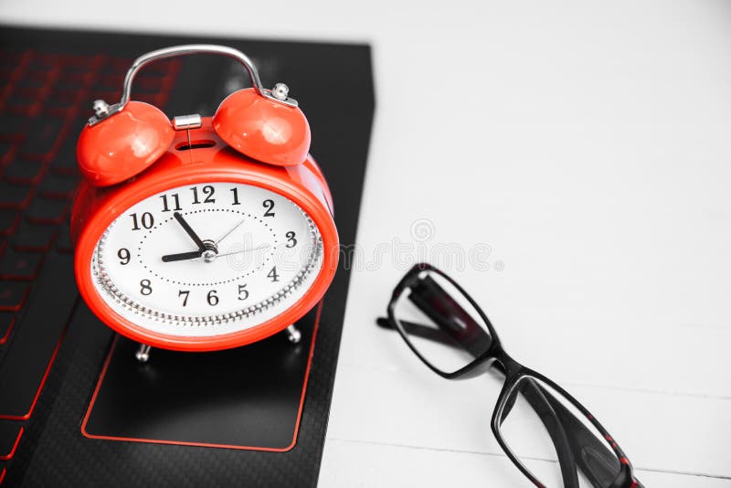 Clock on Keyboard with Glasses Stock Photo - Image of desk, keyboard ...