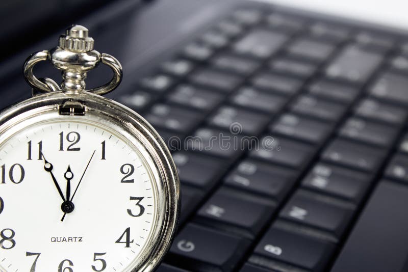 Clock and laptop stock photo. Image of concept, hour - 33555796