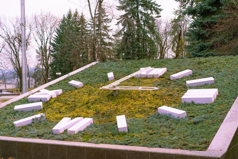 Clock made on the ground stock image. Image of time - 189888569