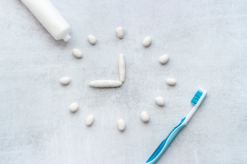 Clock Made of Toothpaste with Toothbrushes. Oral Care and Dental ...