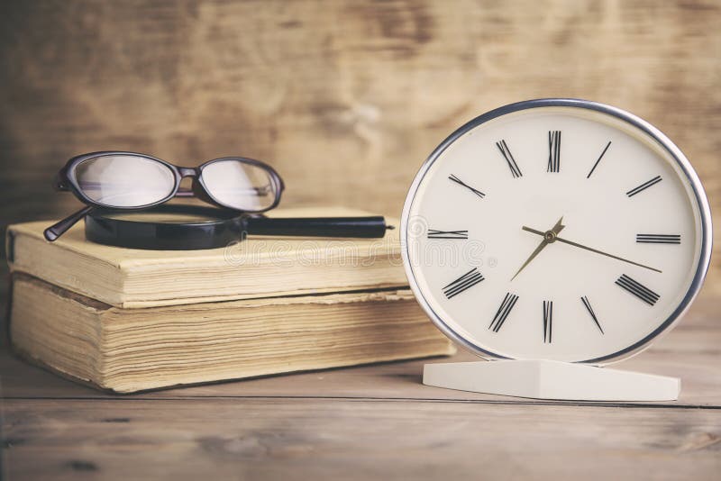 Clock, Magnifying Glass, Light Bulb Icon and Torn Paper Written with ...