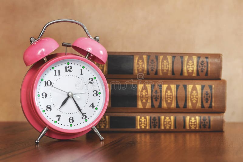 Clock Near Old Vintage Books in the Office or Library Stock Image ...