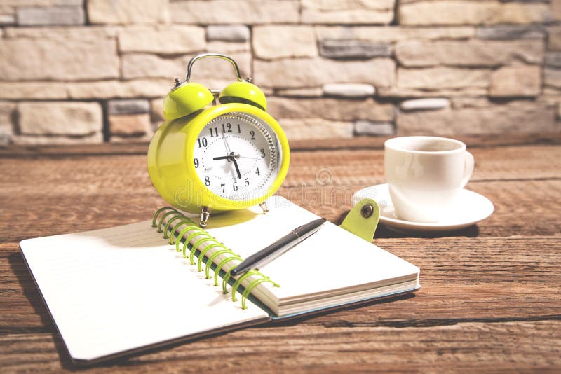 Old Clock , Notepad and Eyeglass on Table Stock Image - Image of pens ...