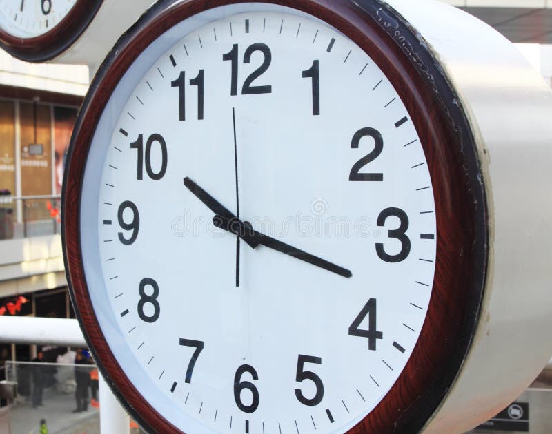 Clock and office buildings stock image. Image of china - 45092995