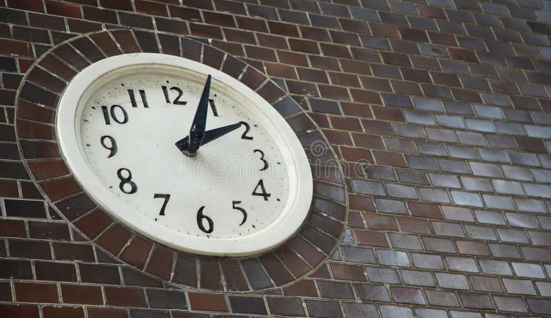 Clock in old brick wall stock photo. Image of iron, brick - 308403464