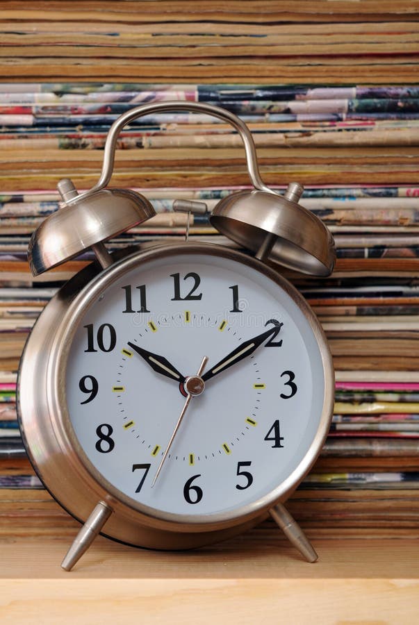 Clock with old magazine stock photo. Image of number - 29237314