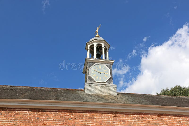 Clock on an Old Stable Block in England Stock Photo - Image of house ...