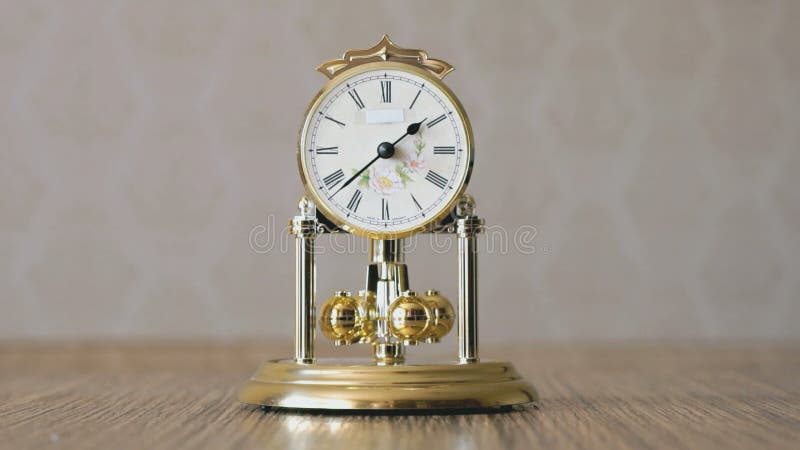 Clock with a Pendulum in a Form of Rotating Balls Stock Video - Video ...
