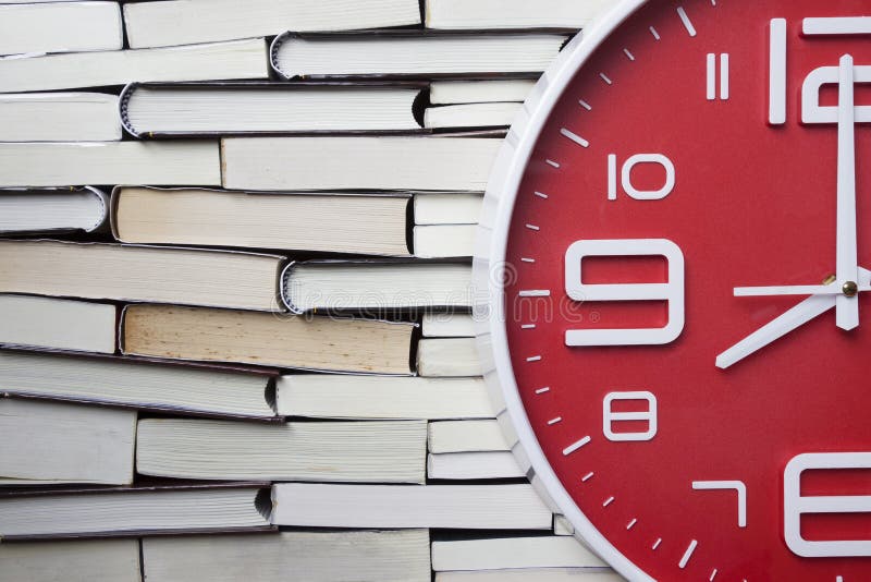 Clock on pile of books stock image. Image of minute, document - 59748741