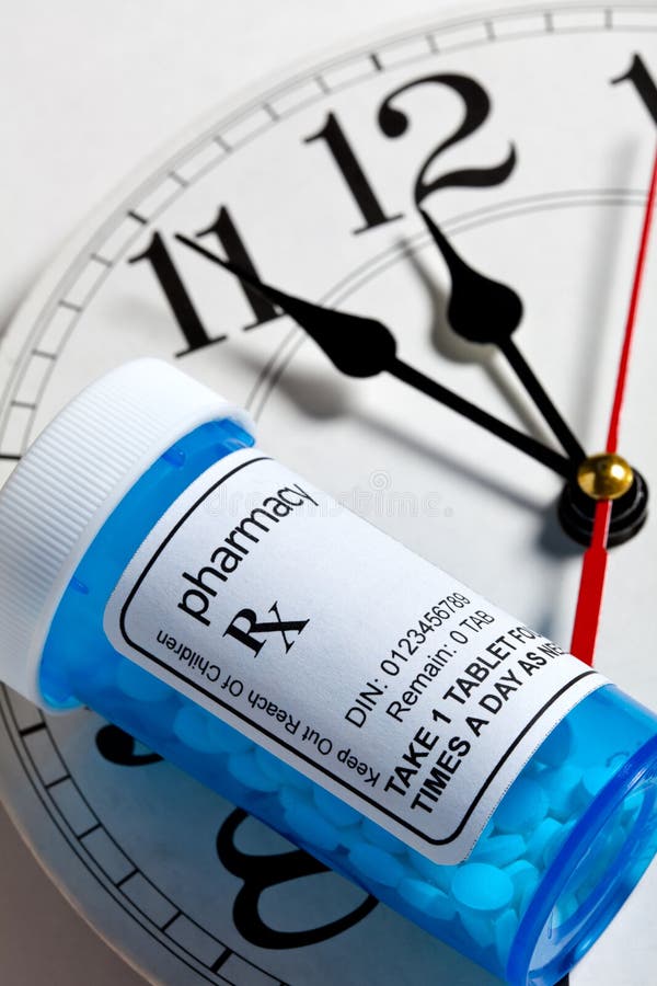 Clock and Pill Bottle stock image. Image of blue, prescription - 84806703
