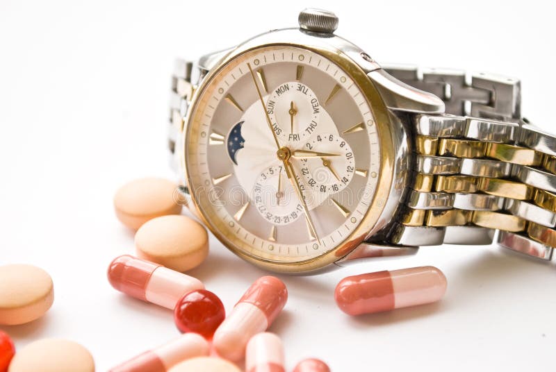 Clock and pills stock image. Image of life, diet, time - 10520459