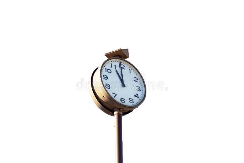 A Clock Positioned on a Tall Pole Displays the Exact Time As 1155 Stock ...