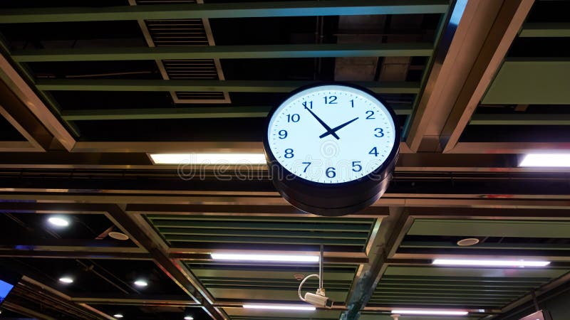 Clock in railway station stock photo. Image of schedule - 61854920