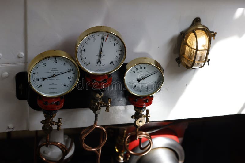 Clock on a Red, Metal Open Engine Editorial Photography - Image of ...