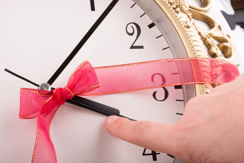 Clock with a ribbon stock image. Image of ribbon, hand - 66549453