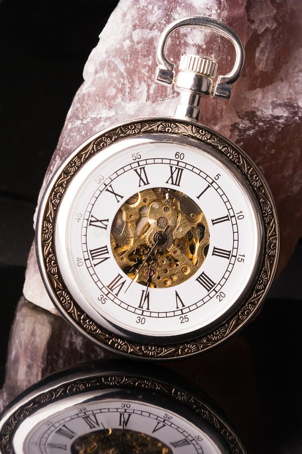 Clock on a rock stock image. Image of curve, classic - 11310477