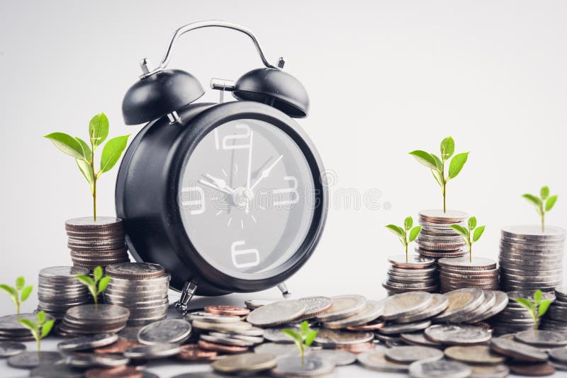 Clock and Rows of Coins for Time of Finance and Business Concept Stock ...