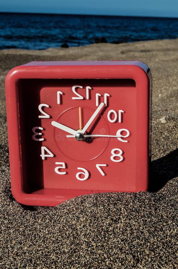 Clock on the Sand Beach stock image. Image of idea, leisure - 304790835