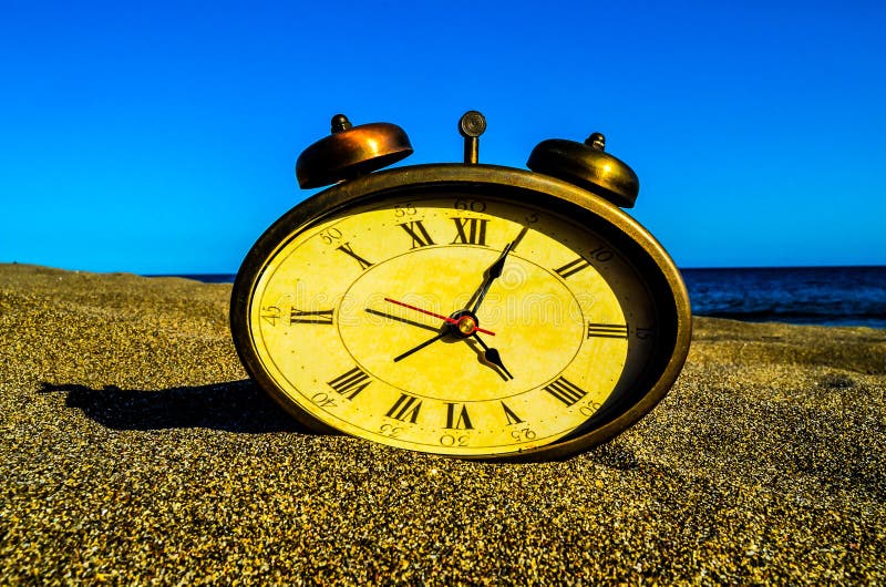 Clock on the Sand Beach stock image. Image of ocean - 305545103
