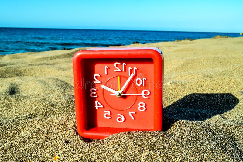 Clock on the Sand Beach stock image. Image of rare, ocean - 326680547