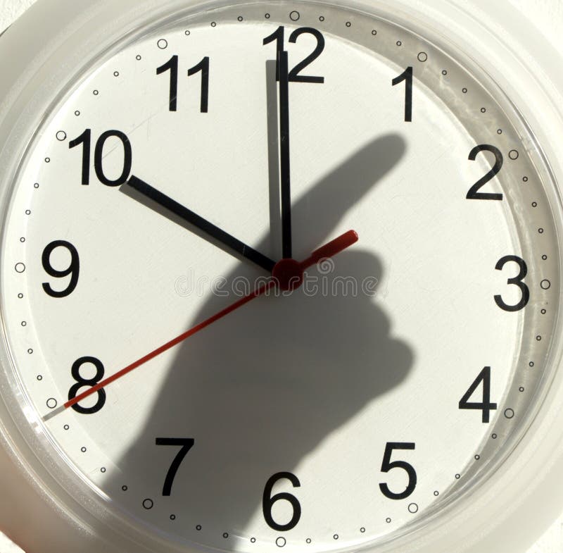 Clock and the Shadow of Hand Stock Image - Image of clock, shade: 4210179