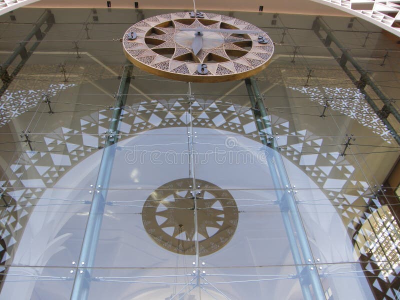 Clock in shape the sun editorial stock photo. Image of reflection ...