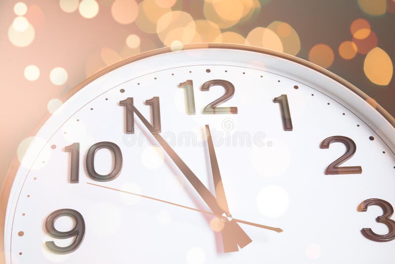 Clock Showing Five Minutes Till Midnight with Bokeh Effect. New Year ...