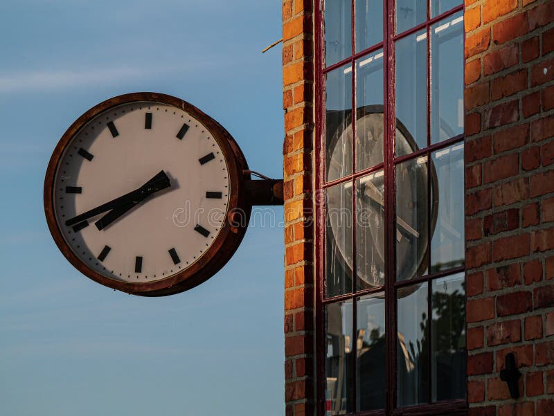 A Clock on the Side of a Building Stock Photo - Image of facade ...