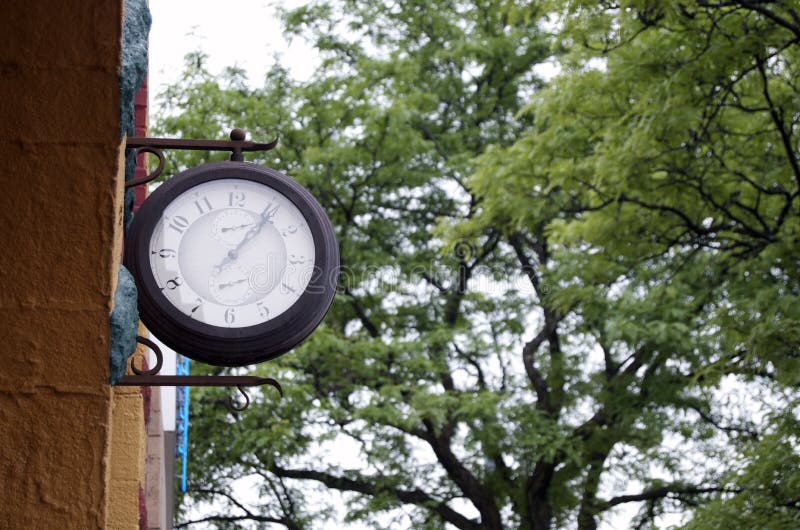 Clock on Side of Building stock image. Image of face - 29058523