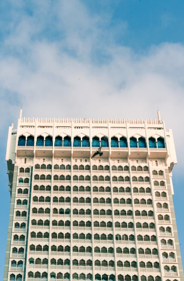 A Clock that is on the Side of a Tall Building Editorial Stock Photo ...