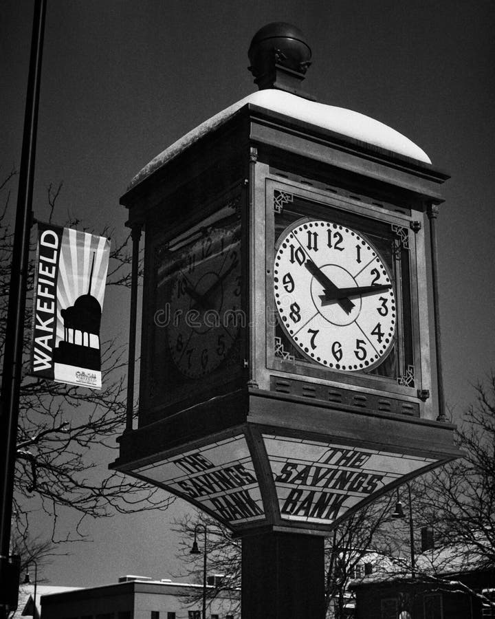 Clock and Snow editorial photography. Image of business - 242654857