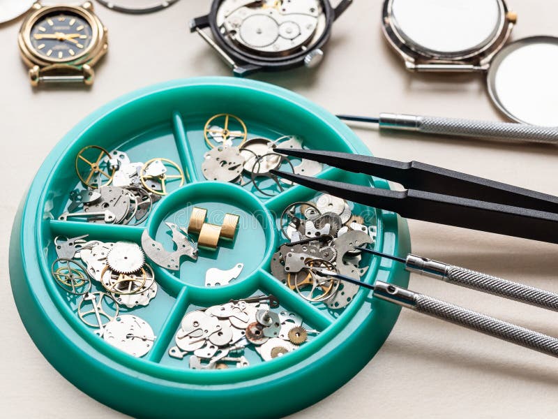 Clock Spare Parts in Tray on Wooden Table Stock Image - Image of close ...