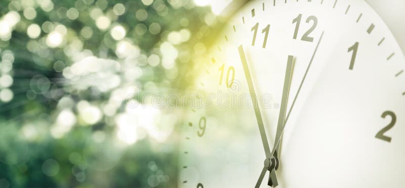 Clock in spring scene stock image. Image of daytime - 182370215