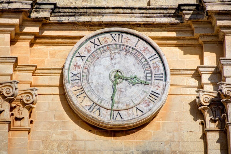 Clock of the St. Peter & Paul Cathedral in the City of Mdina, in Malta ...