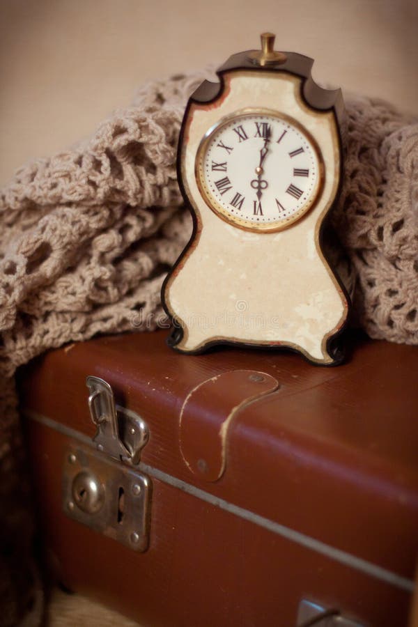 Clock on a Suitcase Covered with a Brown Knitted Blanket Stock Photo ...