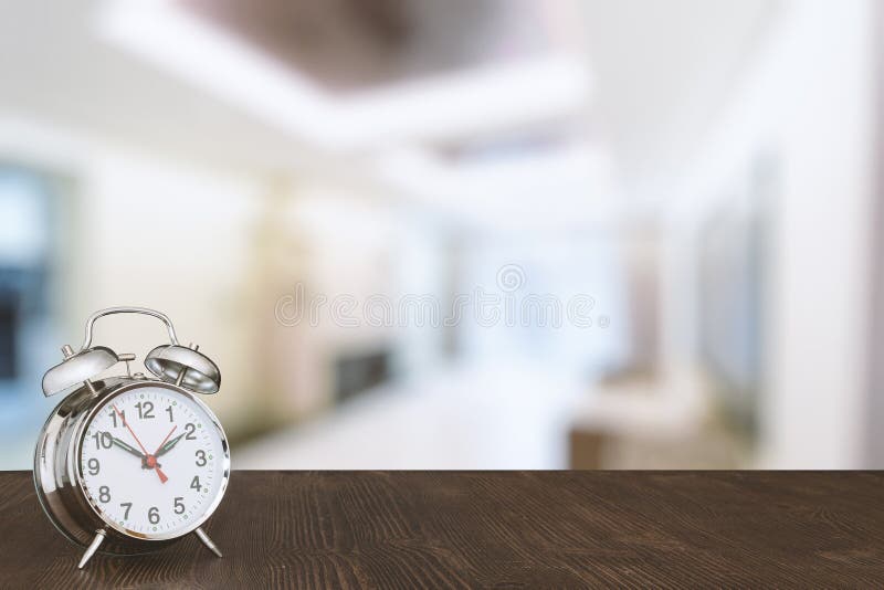 Clock on table stock photo. Image of brown, countdown - 207789640