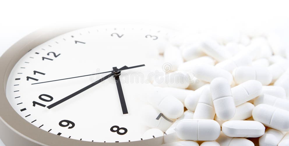 Clock and tablets stock photo. Image of health, medical - 140316680