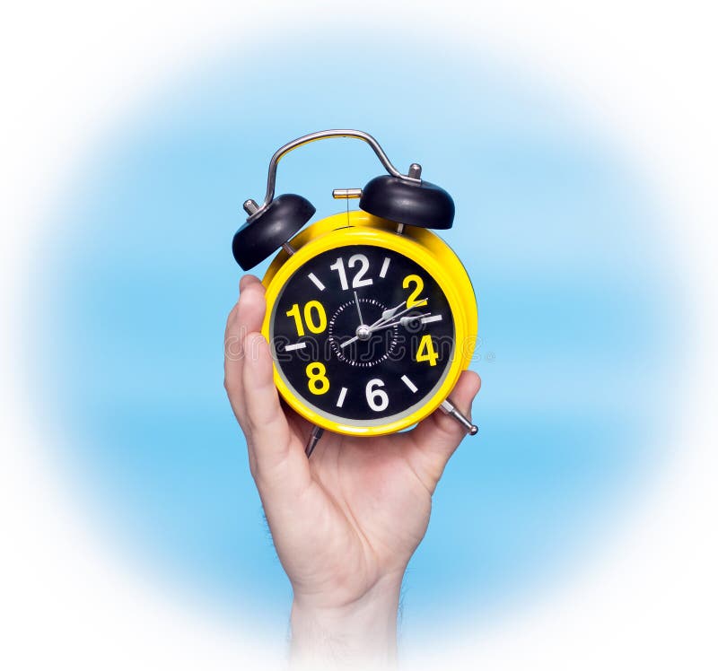 Clock Time Concept. Alarm Clock in a Man S Hand on a Blue Background on ...