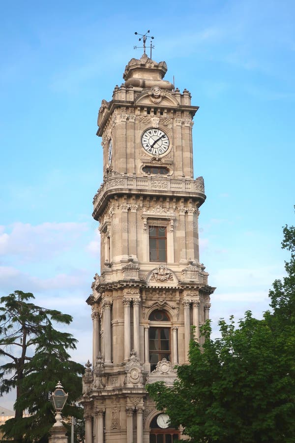 Clock Tower Against Blue Sky. Dolmabahce Palace, Istanbul Stock Image ...