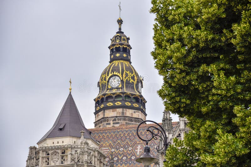 Clock on the Tower of an Ancient Gothic Building in Summer in Europe ...