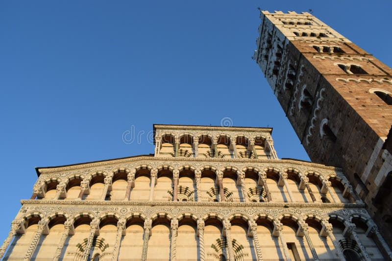 A Clock Tower with a Clock Built Inside the Building in Front Stock ...