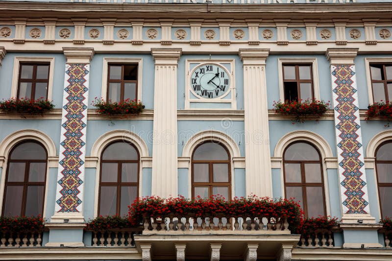 A Clock Tower with a Clock Face and a Large Window Stock Image - Image ...