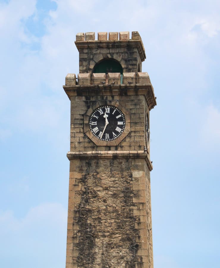 A Clock Tower with a Clock Face Showing the Time of 10:00 Stock Image ...