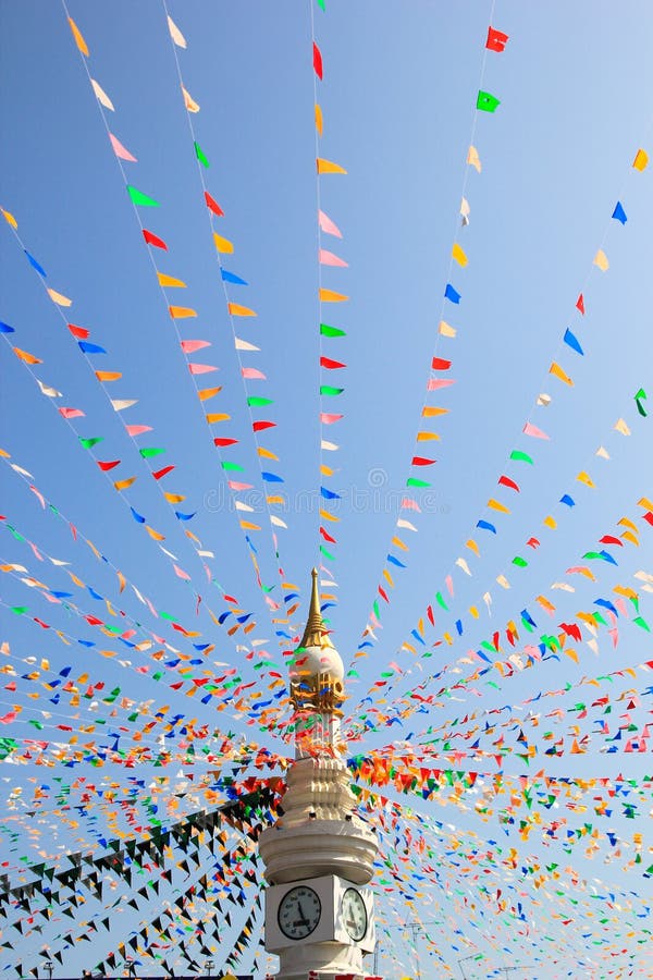 Clock Tower and Colorful Flags. Stock Image - Image of text, yellow ...