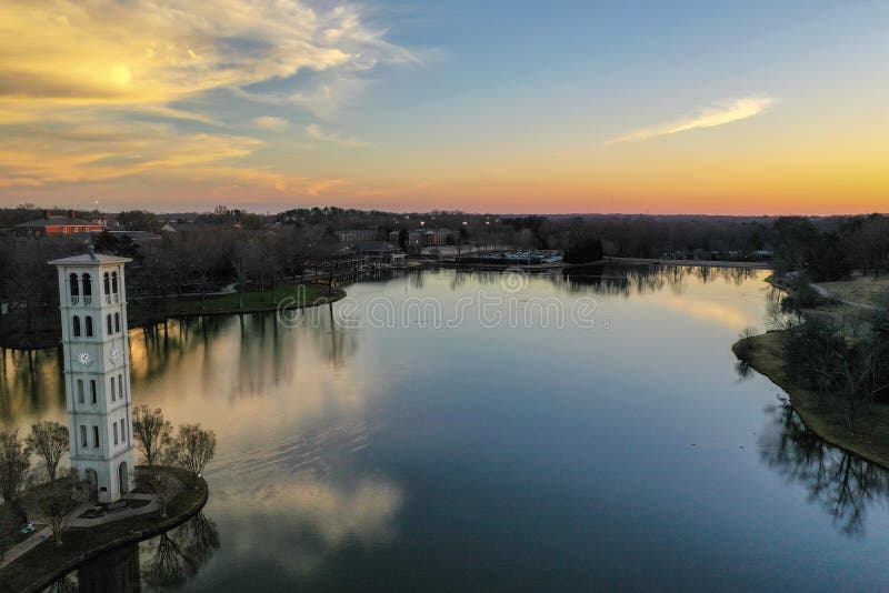 Clock tower on Furman Lake stock photo. Image of university - 138647180