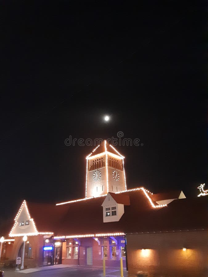 Clock tower magic stock image. Image of yellow, lighting - 204953581