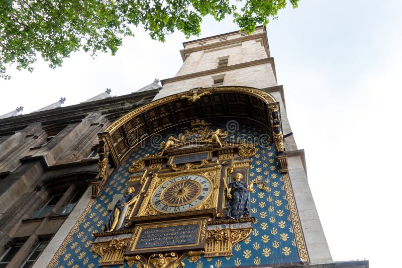The clock tower in paris stock photo. Image of catholic - 286396414