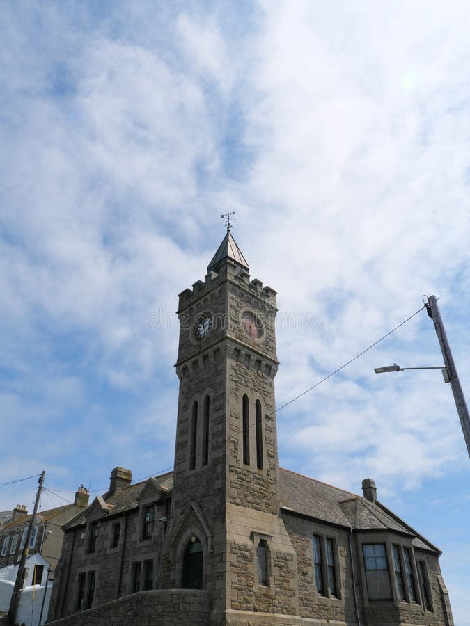 Clock Tower and Pier in the Evening in the Harbor of Porthleven ...